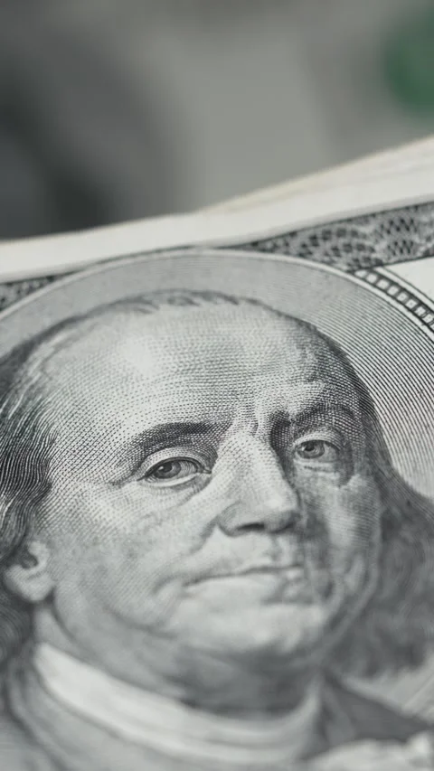 Vertical video of US currency - dollars ... | Stock Video | Pond5