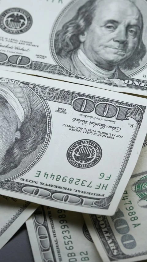 Vertical video of US currency - dollars ... | Stock Video | Pond5