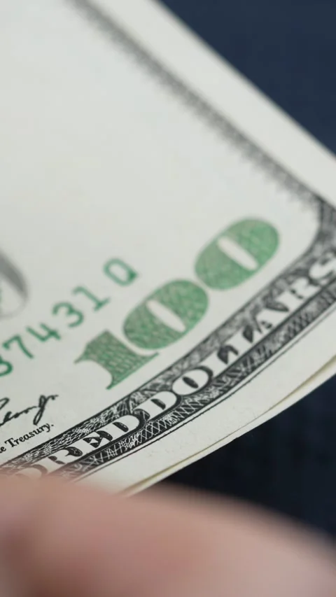 Vertical video of US currency - dollars ... | Stock Video | Pond5