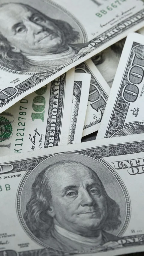 Vertical video of US currency - dollars ... | Stock Video | Pond5