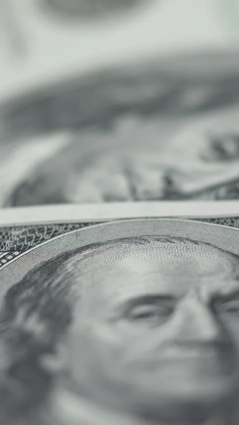 Vertical video of US currency - dollars ... | Stock Video | Pond5