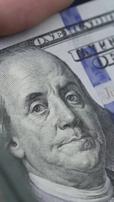 Vertical video of US currency - dollars ... | Stock Video | Pond5