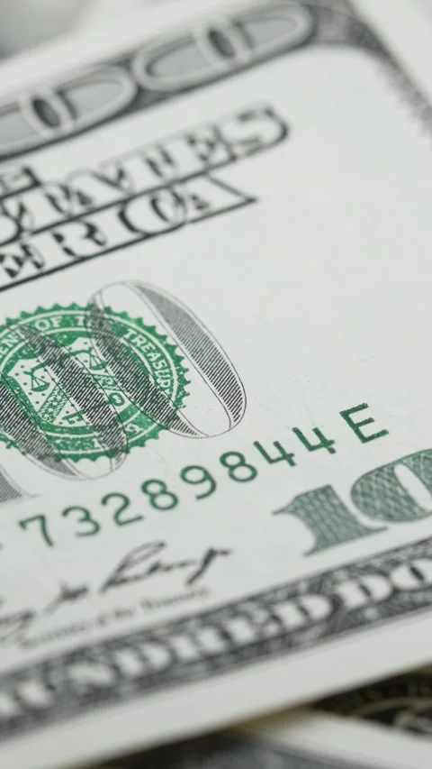 Vertical video of US currency - dollars ... | Stock Video | Pond5