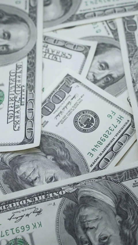 Vertical video of US currency - dollars ... | Stock Video | Pond5