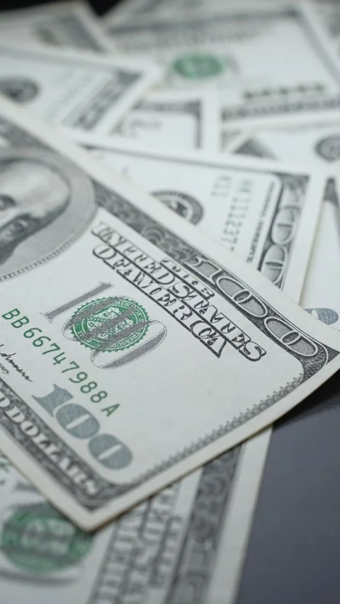 Vertical video of US currency - dollars ... | Stock Video | Pond5