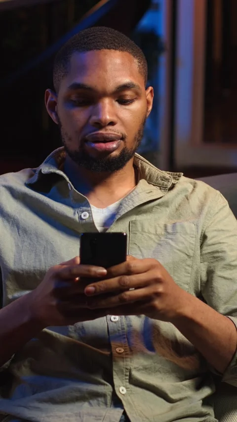 Vertical Video Young black guy texting h... | Stock Video | Pond5
