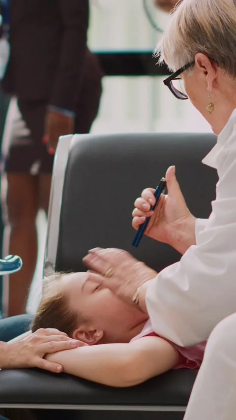 Vertical video: Young child fainting in ... | Stock Video | Pond5