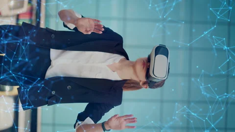 Vertical Video.Woman Wearing VR Helmet W... | Stock Video | Pond5