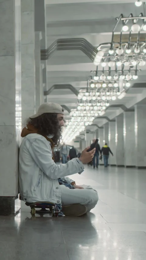 Vertical of Young Guy Waiting for Train ... | Stock Video | Pond5