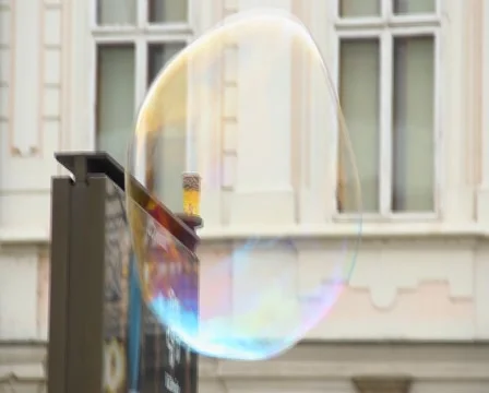 Very big soap bubble flies bursts on cit... | Stock Video | Pond5