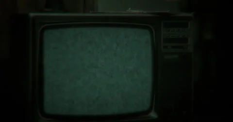 Very creepy and scare vintage tv set wit... | Stock Video | Pond5