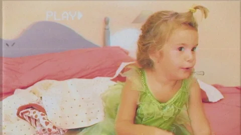 VHS little girl under covers playing | Stock Video | Pond5