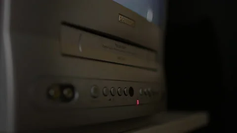 VHS Tape being ejected from TV | Stock Video | Pond5