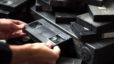 Vhs Tape Being Placed Into Dusty Tape De... | Stock Video | Pond5