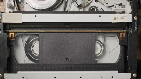 VHS Video Cassette Put Inside VCR Record... | Stock Video | Pond5