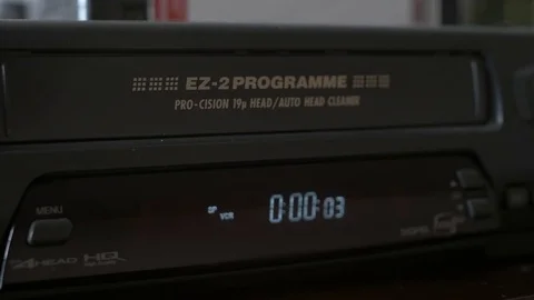 VHS Video Tape being put into Old VCR an... | Stock Video | Pond5