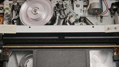 VHS Video Tape Putting Inside a VCR Reco... | Stock Video | Pond5
