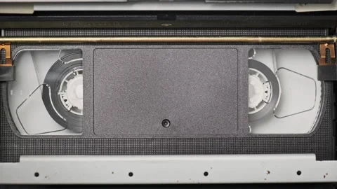 VHS Video Tape Putting Inside a VCR Reco... | Stock Video | Pond5