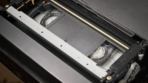 VHS Video Tape Putting Inside a VCR Reco... | Stock Video | Pond5