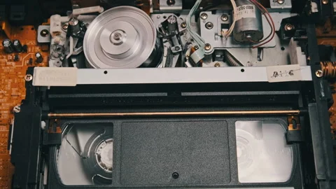 VHS Video Tape Putting Inside a VCR Reco... | Stock Video | Pond5