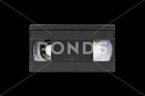 VHS videotape is isolated on a black background front view VHS ...