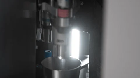 Vials with transparent liquid are sortin... | Stock Video | Pond5