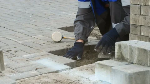 Video 4k resolution. Bricklayer lays bri... | Stock Video | Pond5