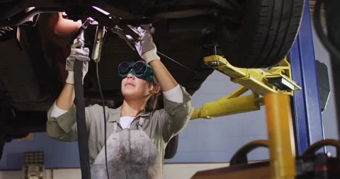 Video of biracial female car mechanic we... | Stock Video | Pond5
