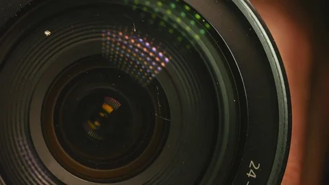 Video camera lens, showing zoom and glar... | Stock Video | Pond5