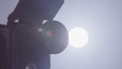 A Video Camera Turning with a Spotlight ... | Stock Video | Pond5