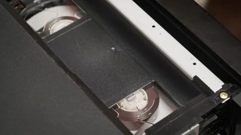 The Video Cassette Inside the Tape Recor... | Stock Video | Pond5