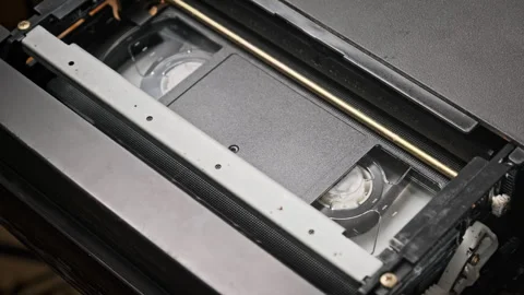 The Video Cassette Inside the Tape Recor... | Stock Video | Pond5