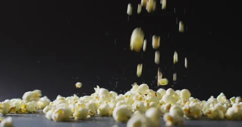 Video of close up of popcorn falling on ... | Stock Video | Pond5