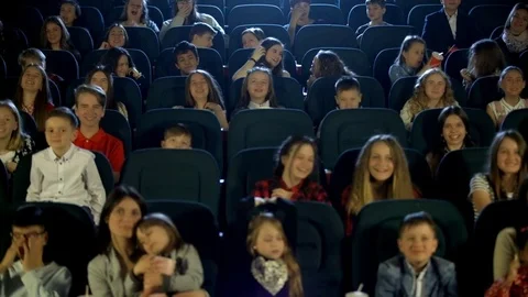 Video frames at the cinema with funny ki... | Stock Video | Pond5