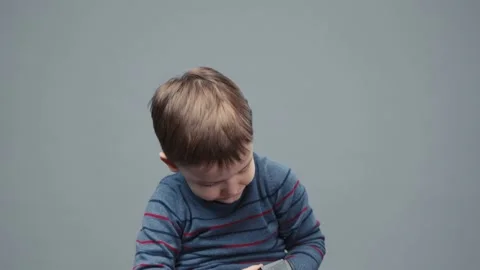 Video of little four-year boy playing wi... | Stock Video | Pond5