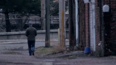 Video of man walking away at a distance ... | Stock Video | Pond5