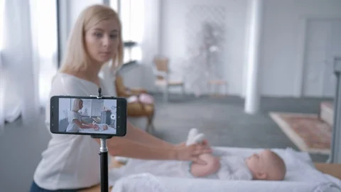 video shooting of blog, young mother use... | Stock Video | Pond5