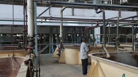 A video shows a man controlling factory ... | Stock Video | Pond5