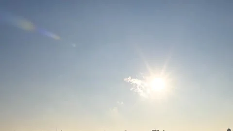 Video of the sun moving across the sky. ... | Stock Video | Pond5