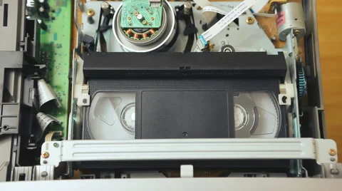 video tape in the VCR, work of mechanism... | Stock Video | Pond5