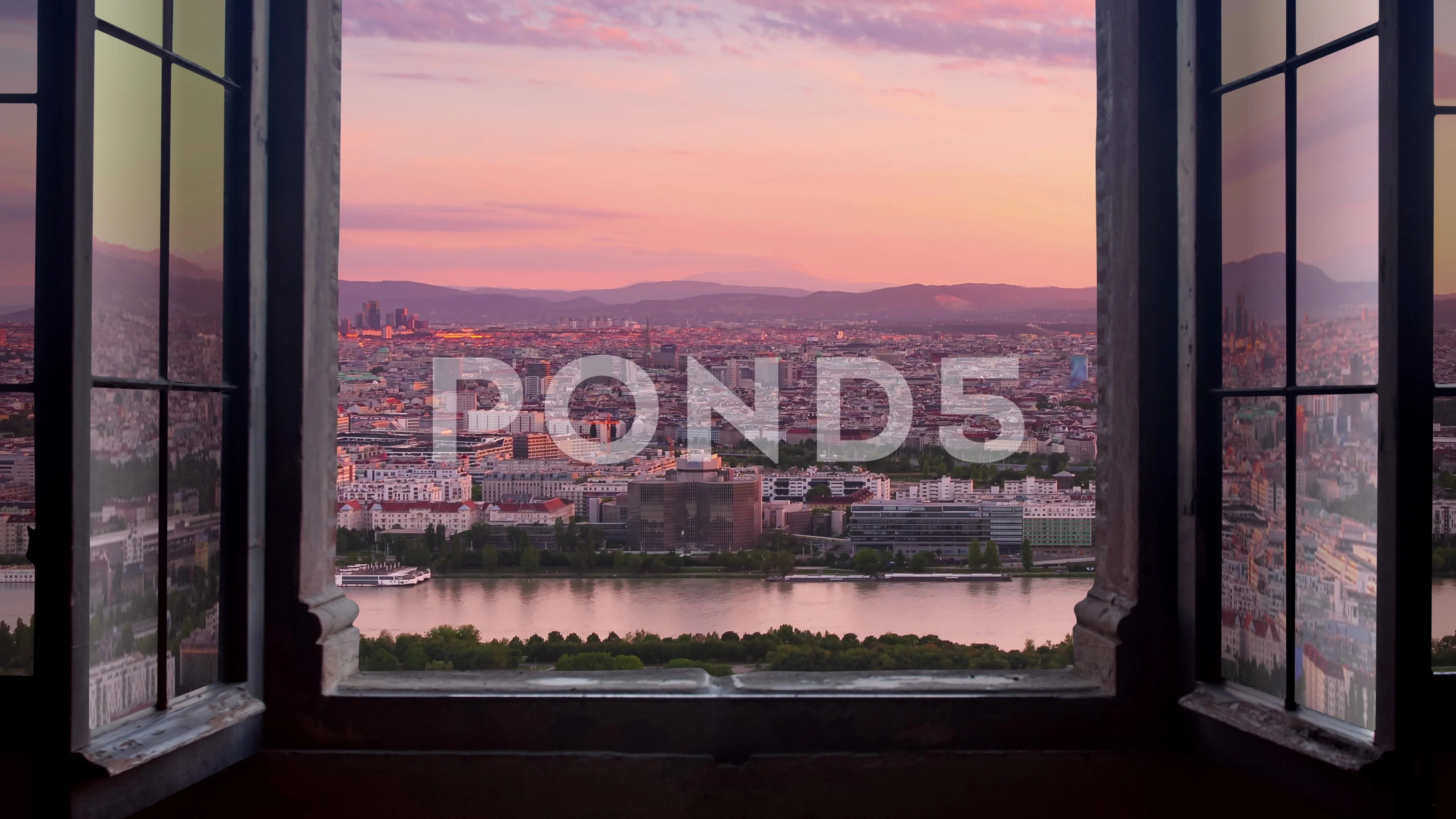 Sunrise Through City Window