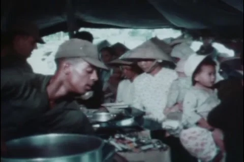 Vietnam War - American soldiers helping ... | Stock Video | Pond5