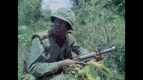 Vietnam War Black Soldier Crouching with... | Stock Video | Pond5