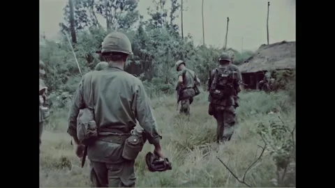 Vietnam War - US soldier loads cannon | Stock Video | Pond5