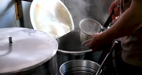 Vietnamese pho soup male seller preparin... | Stock Video | Pond5