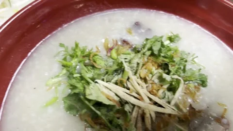 Vietnamese Pork Organs Congee Porridge R... | Stock Video | Pond5