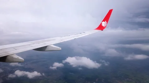 View the atmosphere window wing of a Tha... | Stock Video | Pond5