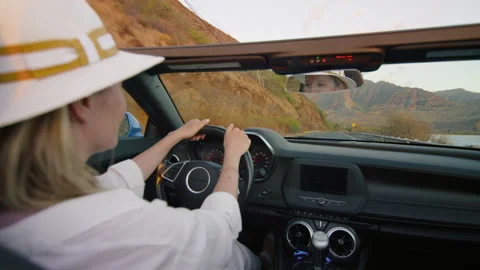 View from back seat of convertible car, ... | Stock Video | Pond5