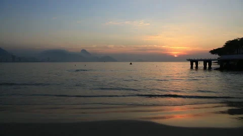 View of the beach at sunset in Rio de Ja... | Stock Video | Pond5