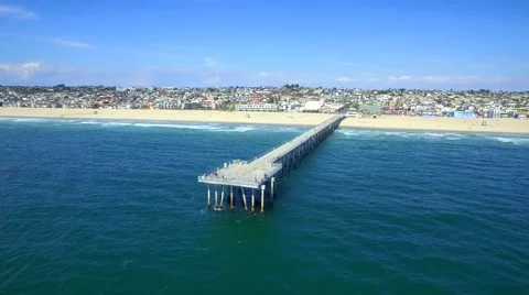 View of Beach Town with Dock From Beach ... | Stock Video | Pond5